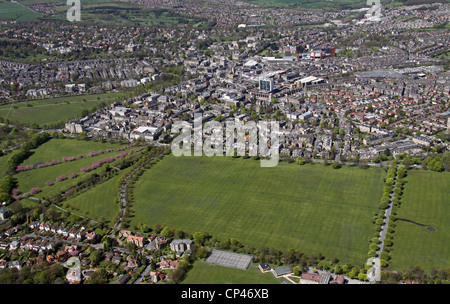 An aerial cityscape of Harrogate town with The Stray public park and ...