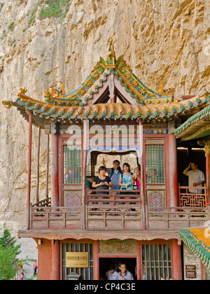 woman visiting the old chinese house. with old furniture and decoration ...