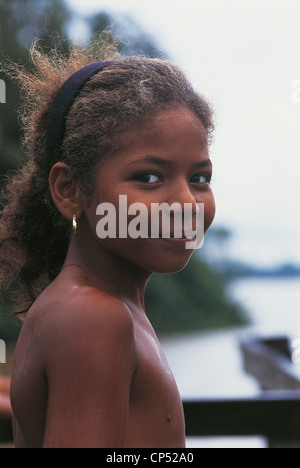 Brazil, Belem, South America, portrait of a man standing in a sumauma ...