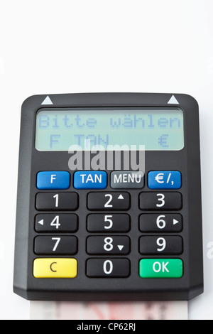 Tan generator on white background Stock Photo - Alamy