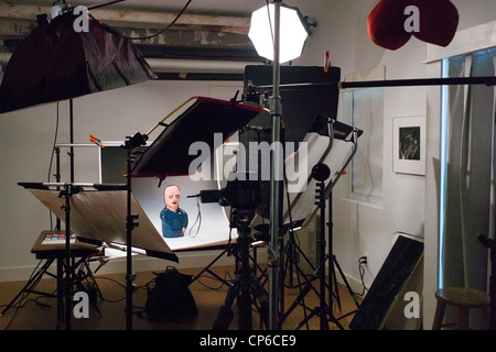 Lighting, grip and camera equipment in a commercial photography studio ...