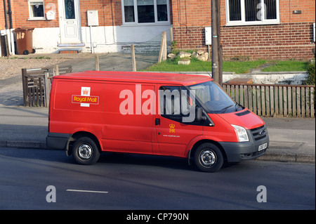 A Royal Mail delivery van and driver on Argyll Street, outside the ...
