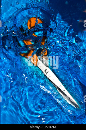 razor close-up with water splash isolated on grey Stock Photo - Alamy