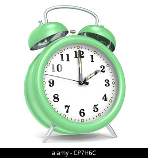 Classic alarm clock on a green background Stock Photo - Alamy