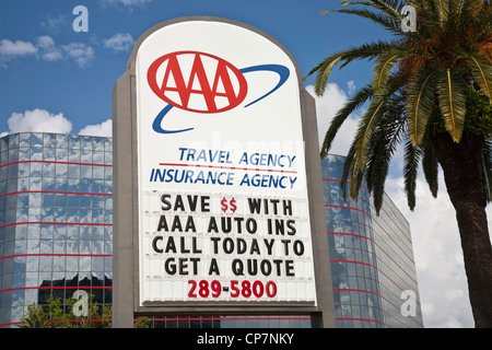 A sign for the American Automobile Association, AAA, is seen at a car ...