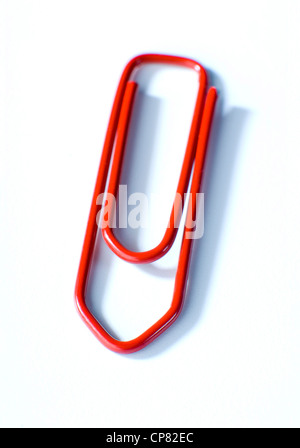red paper clip on white background Stock Photo - Alamy
