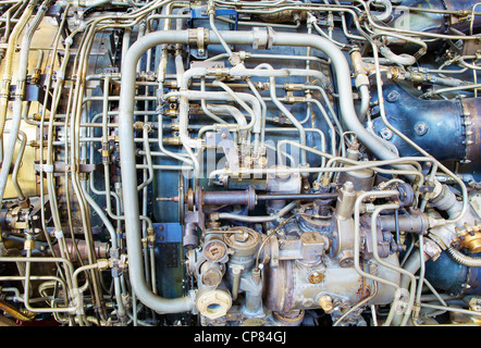 The complicated plumbing of tubing inside a jet engine Stock Photo - Alamy