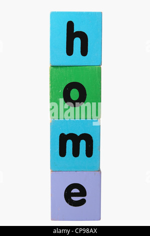 The Wooden letters spell home against a blue backdrop Stock Photo - Alamy