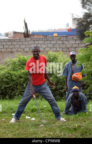 Rwandese people participate in the national clean-up day, Umuganda, in ...
