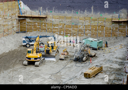 Huge construction hole being dugs for the foundation of a skyscraper in ...
