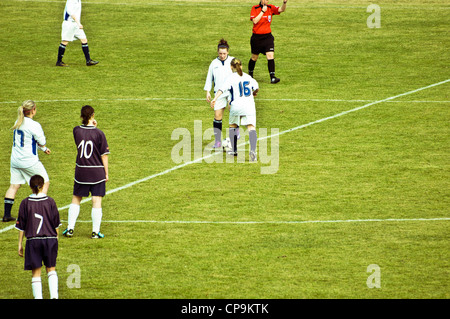 Football players starting game Stock Photo - Alamy