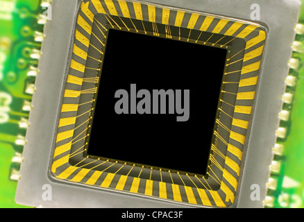 Light sensor of digital camera close-up photo with colored interference ...