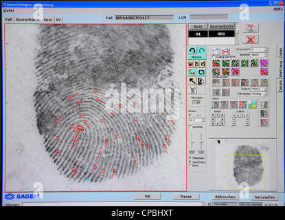 A CSI (Crime Scene Investigator) fingerprinting a glass ornament using ...