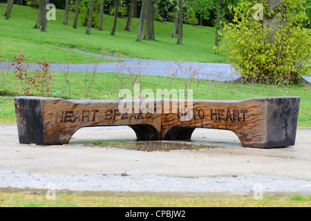 Commemorative park bench Stock Photo - Alamy