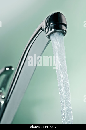 jet of water out of tap, close-up Stock Photo - Alamy