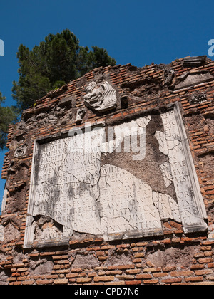 Latin inscription on an old Roman plaque inside the towns amphitheatre ...