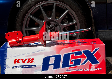 Macpherson strut shock absorber Stock Photo - Alamy