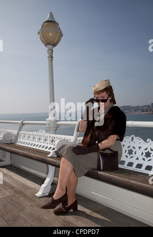 1940`s dressed woman on seafront location Stock Photo - Alamy
