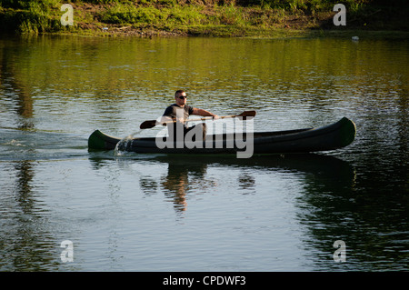 A man are rowing kayak boat in the sea Stock Photo - Alamy