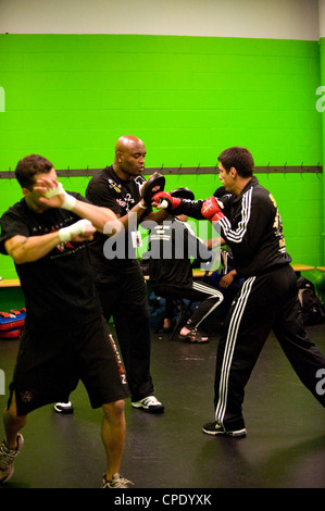 Sport man Warming Up. Pre workout Warm up. Man Doing Excersises ...