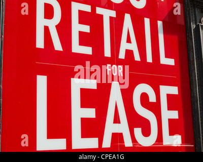 FOR LEASE red sign with white word and empty space for text on wooden ...