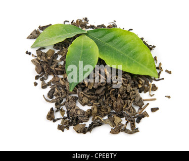 Green tea leaves on color background Stock Photo - Alamy