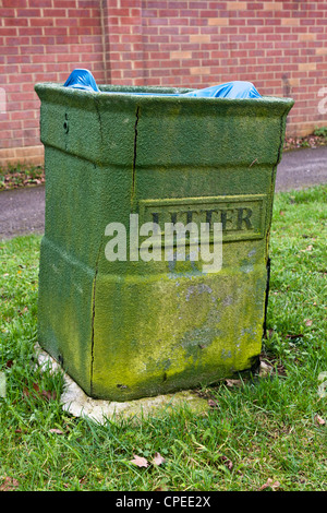 Litter bin on public road. KFC garbage bin and rubbish all around empty ...