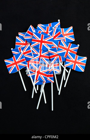 Small British Union Jack celebration flags against a blue sky Stock ...