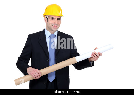 Engineer pulling a technical drawing out of its case Stock Photo - Alamy