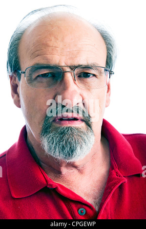 A stern-looking man with a receding hairline and distinctive hair ...