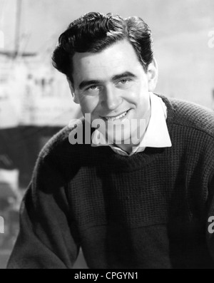 1950s 1960s PORTRAIT SMILING MAN STANDING WITH HANDS IN POCKETS WEARING ...