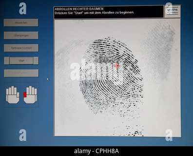 Police, taking fingerprints, digitally from a suspect person Stock ...
