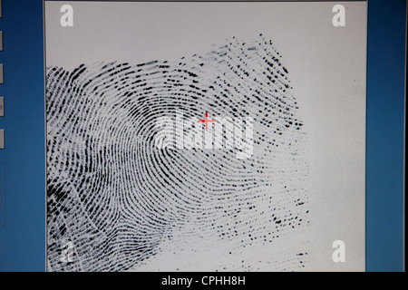 Police, taking fingerprints, digitally from a suspect person Stock ...