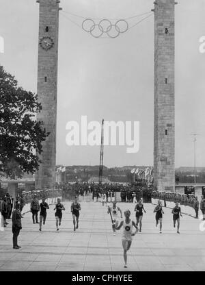 Olympic flame at the stadium in Berlin 1936 Stock Photo - Alamy