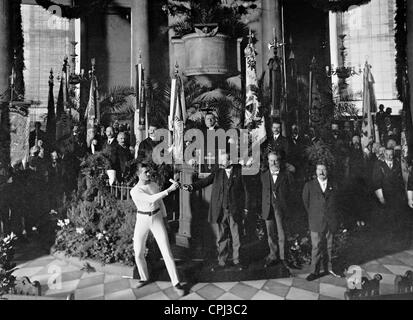 Relay race handing over from woman to man Stock Photo - Alamy