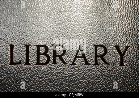 A Library sign on a bubble glass window at University of Birmingham, UK ...