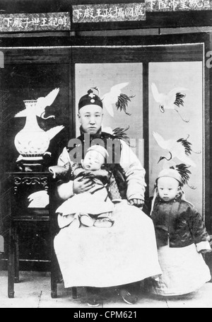 Three year old Emperor of China, Puyi, right, with his father, Prince ...