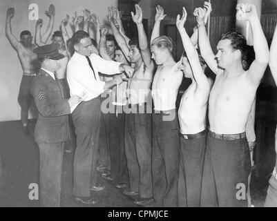 Medical examination of a soldier, 1935 Stock Photo - Alamy