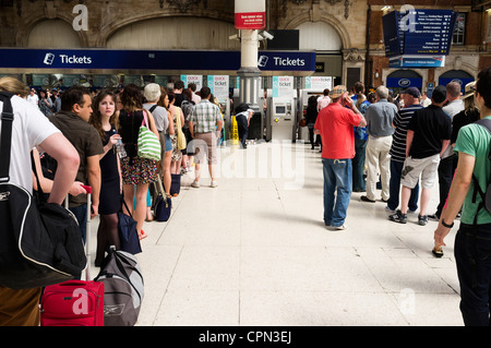 Long queues for Train tickets at London's Victoria Station Stock Photo ...