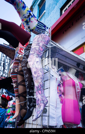 Street market stall with colorful tights and stocking on display Stock ...