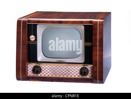 Television in the 1950s. Early television set with folding doors that ...