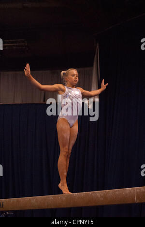 McKenzie Wofford goes throuh her moves on the balance beam Stock Photo ...