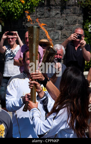 The Olympic torch Kiss Stock Photo - Alamy