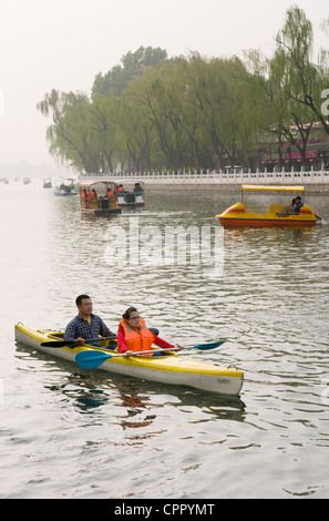 Paddle boats on Hou Hai Lake in the Houhai bar area, Beijing, China ...