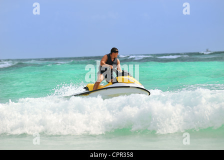 Man on Wave Runner turns fast on the water Stock Photo - Alamy