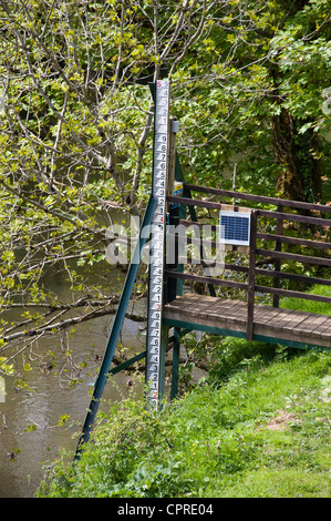 Flood depth marker set up beside the River Tamar near Greystone Bridge ...