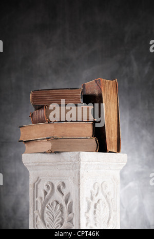 Old yellowed books stacked on the shelf in bookcase, library Stock ...