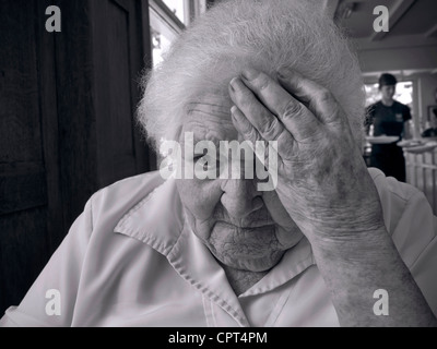 An elderly lady with dementia in a care home. Picture: Scott Stock ...