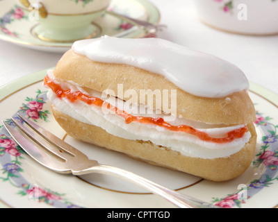 iced finger frosted bun cream filled with jam Stock Photo - Alamy