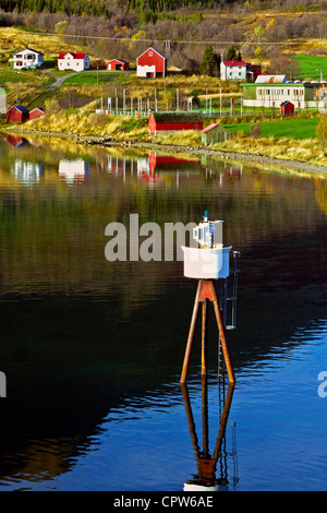 Navigation buoy on a Norwegian Fjord Stock Photo - Alamy
